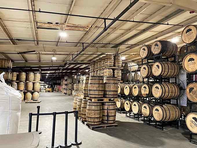 Barrels stacked at 13th Colony Distillery show that craft spirits can exist outside overpriced urban tasting rooms.