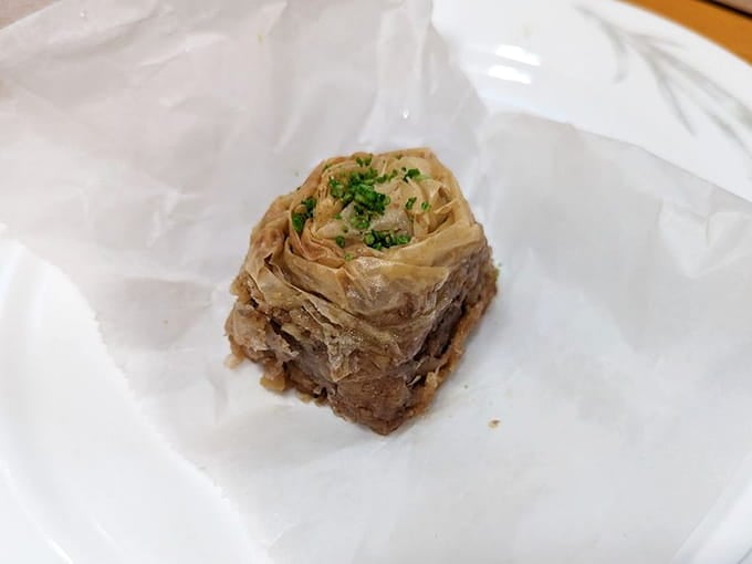 Baklava rolled into perfect spirals, because the Greeks understood that presentation matters almost as much as taste.