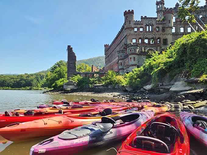 Colorful kayaks lined up like candy waiting to ferry adventurers across the water to explore this magnificent ruin.