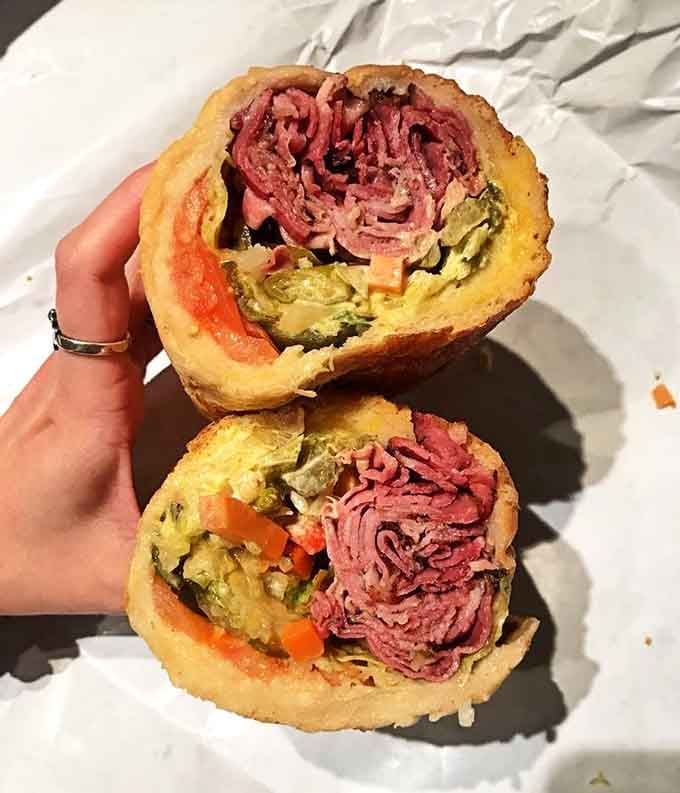 That pastrami cross-section shows more beautiful layers than a geological formation, and tastes infinitely better than rocks.