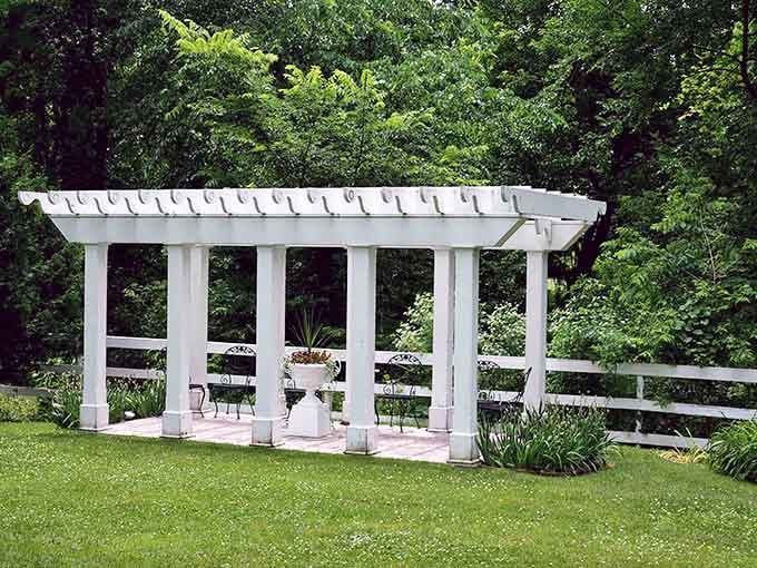 A pergola that screams "garden party" louder than your aunt at a family reunion with gossip.
