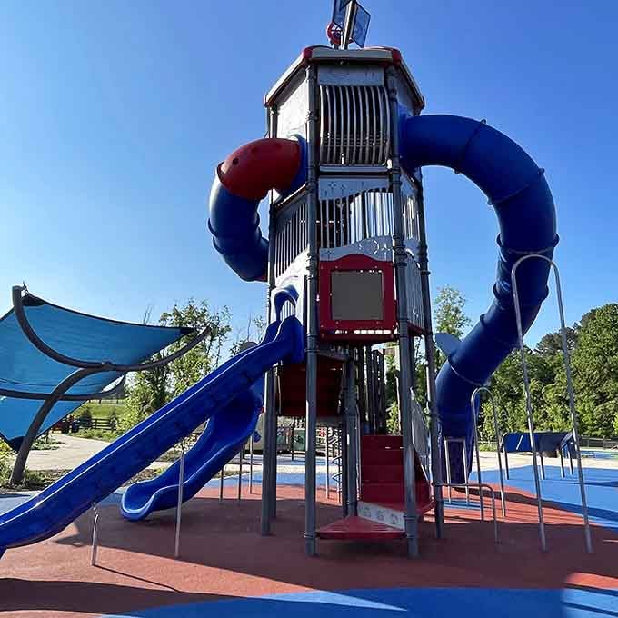 That tower stands tall like a beacon of fun, calling to children from across the entire park.