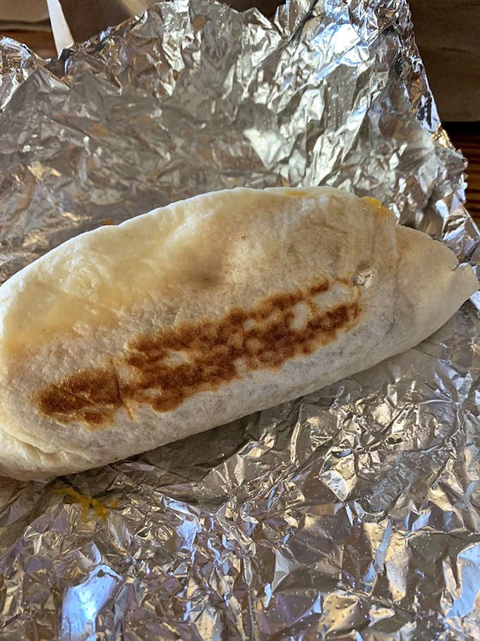 The breakfast taco, wrapped like a present waiting to be unwrapped. Morning happiness in handheld form.