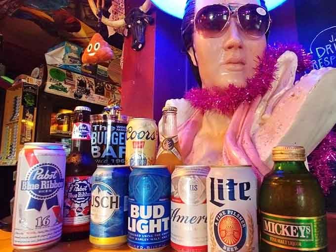 That mannequin has seen some things, but she's still keeping watch over the beer selection with style.