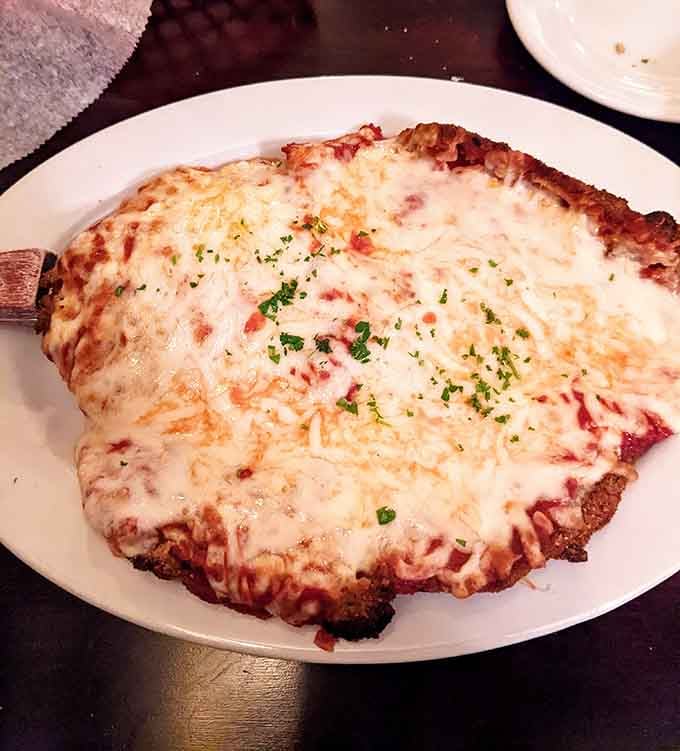 Veal parmigiana that's been pounded thin, breaded perfectly, and covered in enough cheese to make you smile involuntarily.