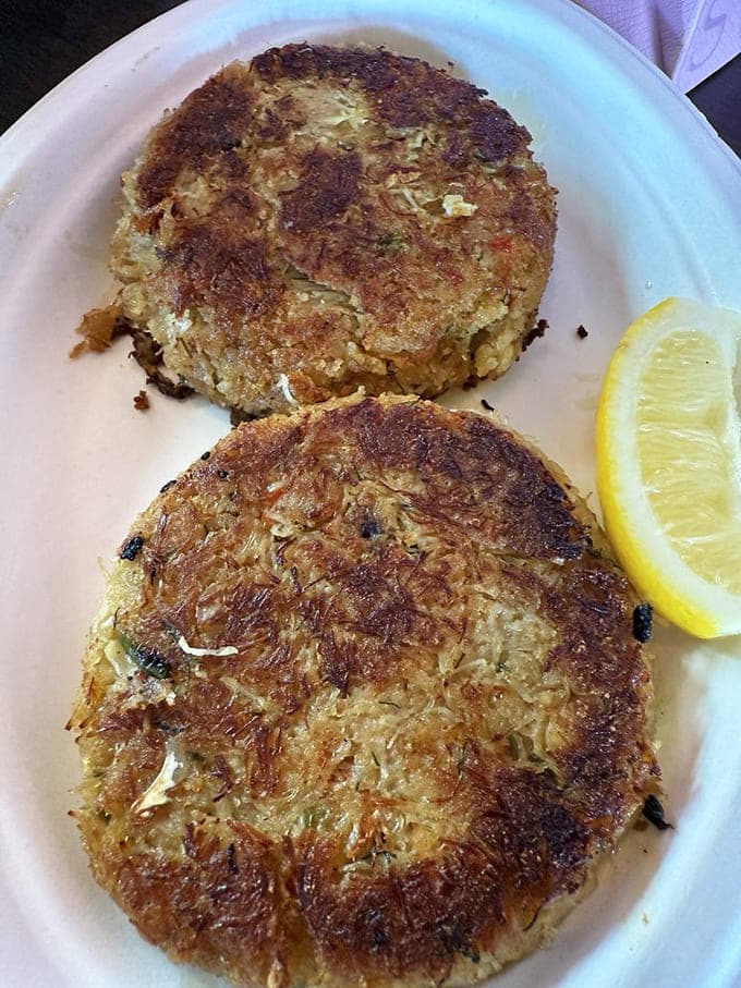 These aren't your average crab cakes - they're golden discs of mostly-crab with just enough binding to maintain their dignity.