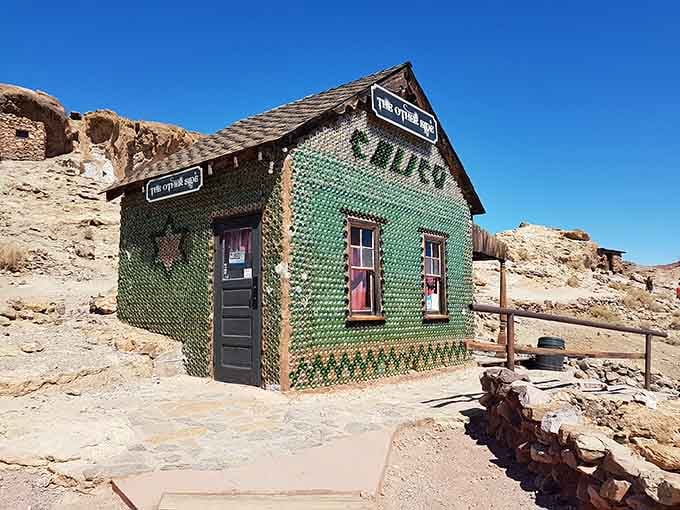 That bottle house proves pioneers were the original recycling champions, turning trash into architectural genius.