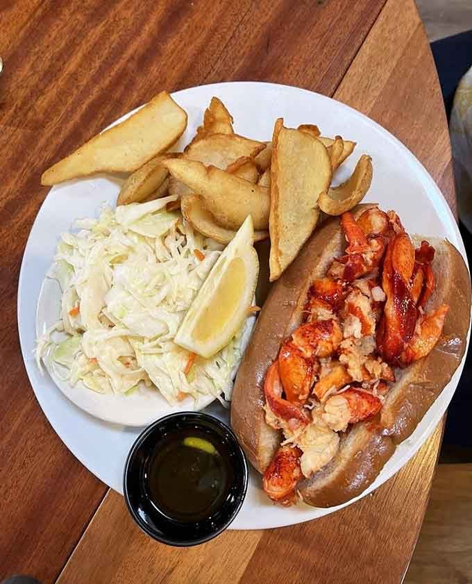 Fresh lobster meat nestled in a toasted roll, the kind of simplicity that requires absolute perfection.