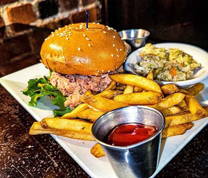 A pulled pork sandwich with golden fries proves this coffee shop knows its way around lunch just fine.