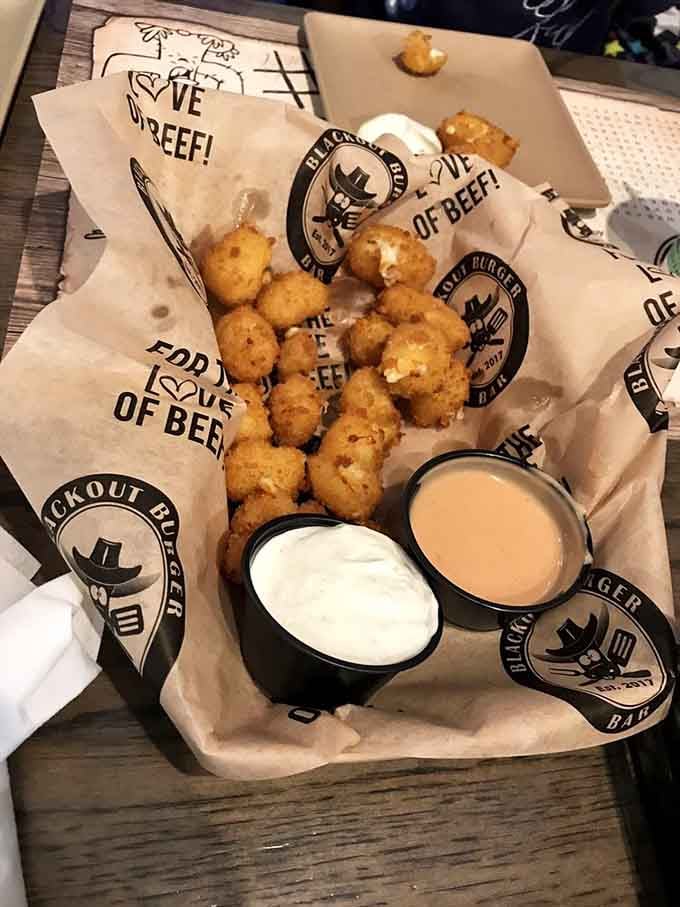 Wisconsin cheese curds fried to golden perfection&mdash;like little nuggets of happiness that squeak their way straight to your soul.