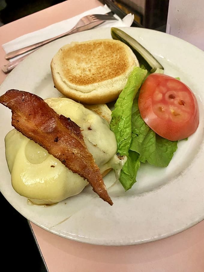 The classic cheeseburger setup&mdash;complete with pickle spear sentinel&mdash;proves that some designs achieve perfection without needing constant reinvention.