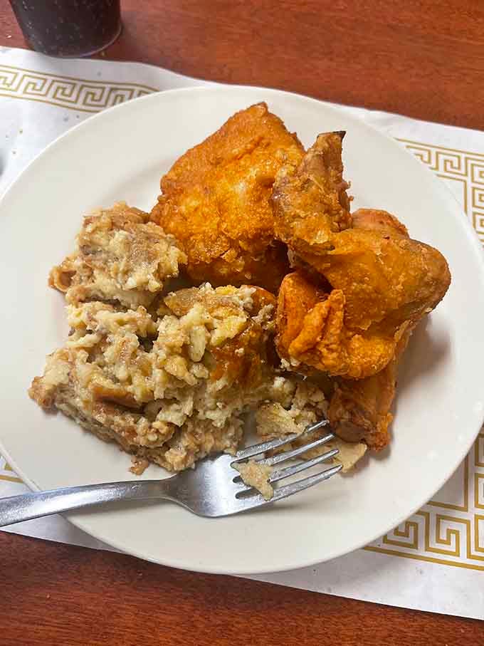 The broasted chicken and dressing plate&mdash;where crispy, juicy perfection meets savory, herb-infused goodness. Diet plans surrender at first bite.