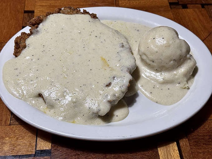 When comfort food calls, Pelican's answers with dishes like this chicken fried steak, smothered in creamy gravy that would make any grandmother proud.