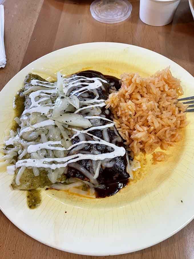 These enchiladas aren't drowning in sauce&mdash;they're swimming in flavor. The perfect balance of spice, cheese, and that impossibly perfect Mexican rice.