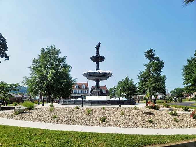 This elegant fountain stands like a Victorian centerpiece in Parkersburg's outdoor living room. Water dances in the sunlight while locals gather to escape the summer heat.