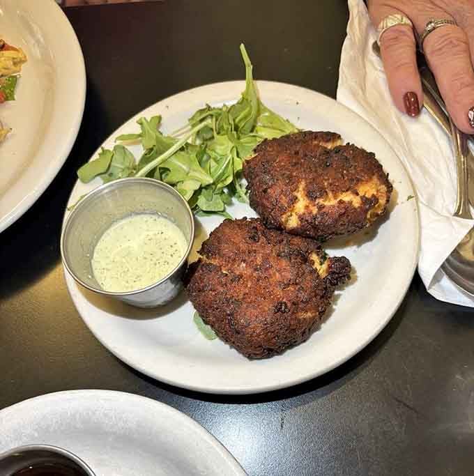 Crispy crab cakes with that perfect golden crust. These aren't messing around with your breakfast expectations.