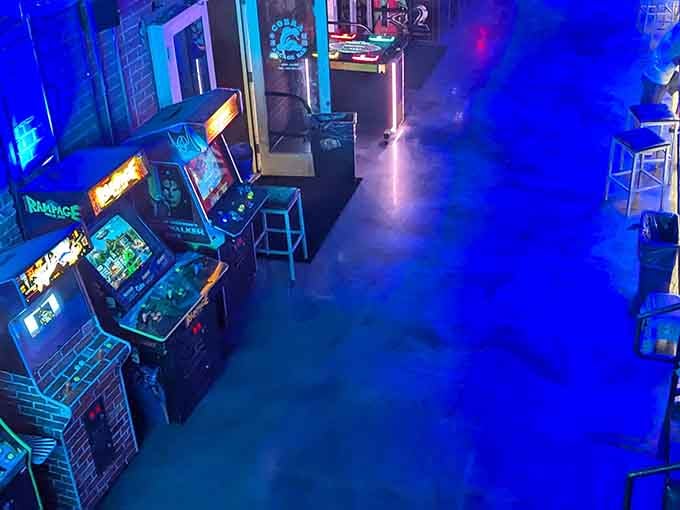 From above, the arcade floor looks like a candy-colored maze designed specifically for nostalgic adults with disposable income.
