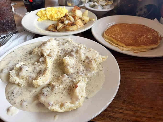 Biscuits drowning in sausage gravy is the kind of breakfast that makes mornings worth facing.
