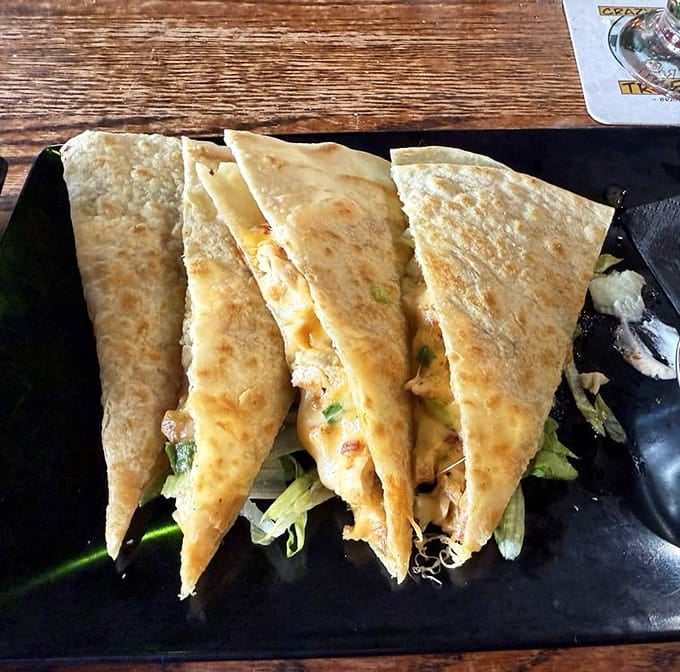 Quesadilla wedges lined up like delicious soldiers, ready to march straight into your very grateful stomach.