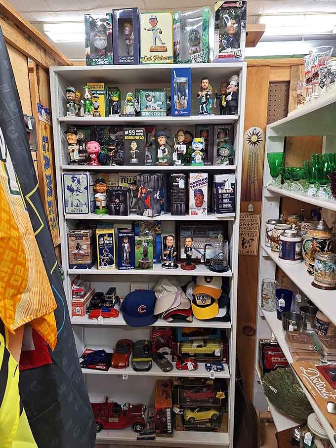 Sports bobbleheads and collectibles line the shelves like a hall of fame you can actually afford to take home.