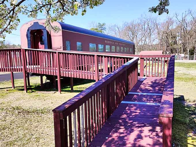 The elevated walkway leads you straight into a passenger car where countless travelers once sat dreaming.