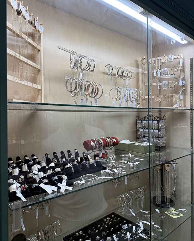 Sparkling jewelry cases gleam with treasures that once adorned wrists at parties where everyone actually dressed up for occasions.