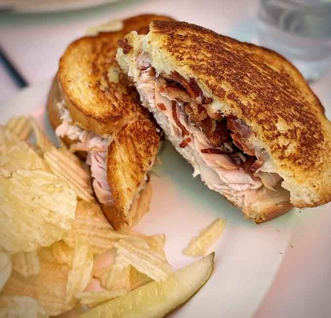 That golden-grilled perfection holds layers of turkey and bacon that'll make your taste buds sing.