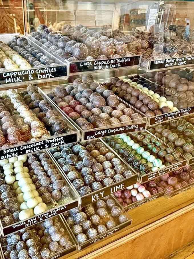 Rows of truffles in flavors ranging from cappuccino to key lime, like a chocolate United Nations.
