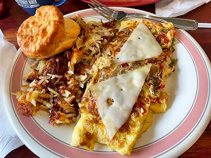 That golden omelet stuffed with goodness alongside crispy hash browns will fuel your entire day, possibly your entire week.