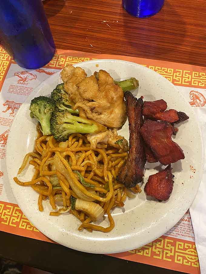 The Mongolian BBQ plate: proof that watching your food sizzle makes it taste approximately 47% better somehow.