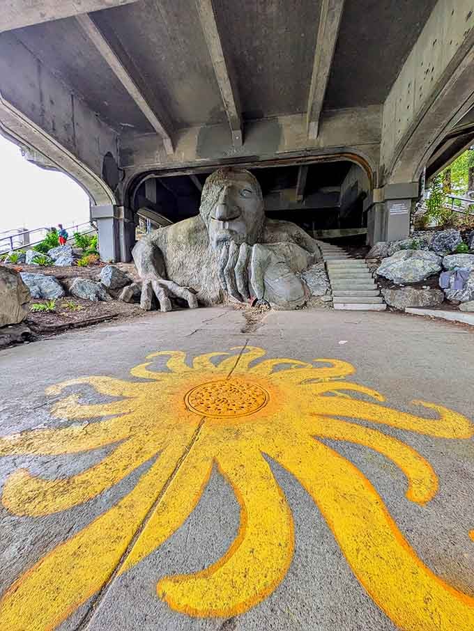 Street art meets sculpture in this colorful space where creativity thrives beneath the concrete and steel above.