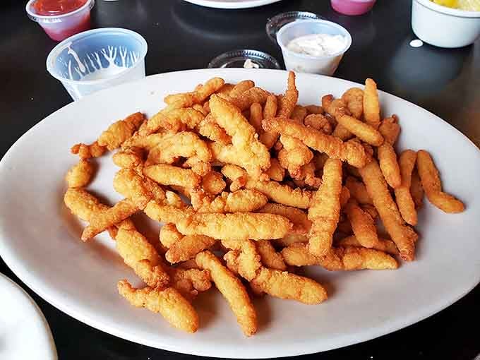 These golden fried clams could make a New Englander question their loyalty&mdash;crispy, tender, and piled high like edible treasure.