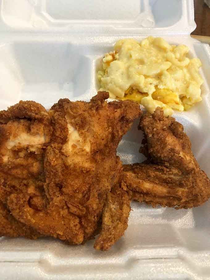 Fried chicken that's achieved the golden-brown perfection that would make Colonel Sanders question his life choices, paired with creamy mac and cheese.