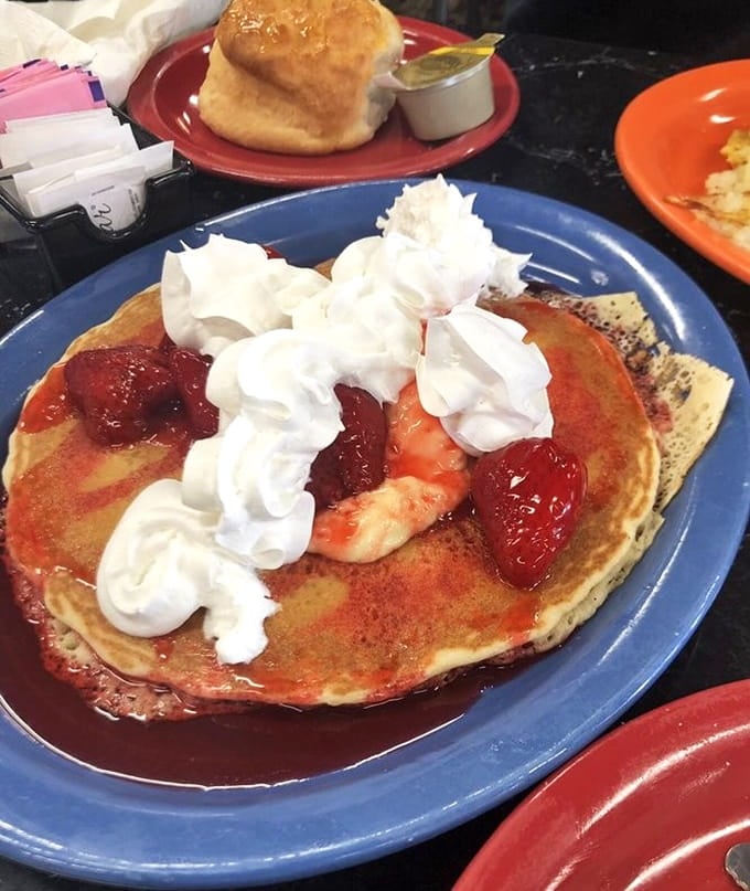 Strawberry-topped pancakes with whipped cream that look like they belong on a magazine cover, taste even better.
