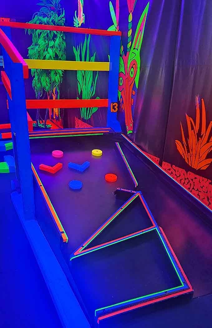 Geometric obstacles glow in impossible colors, turning simple putts into navigational challenges worthy of a starship captain.