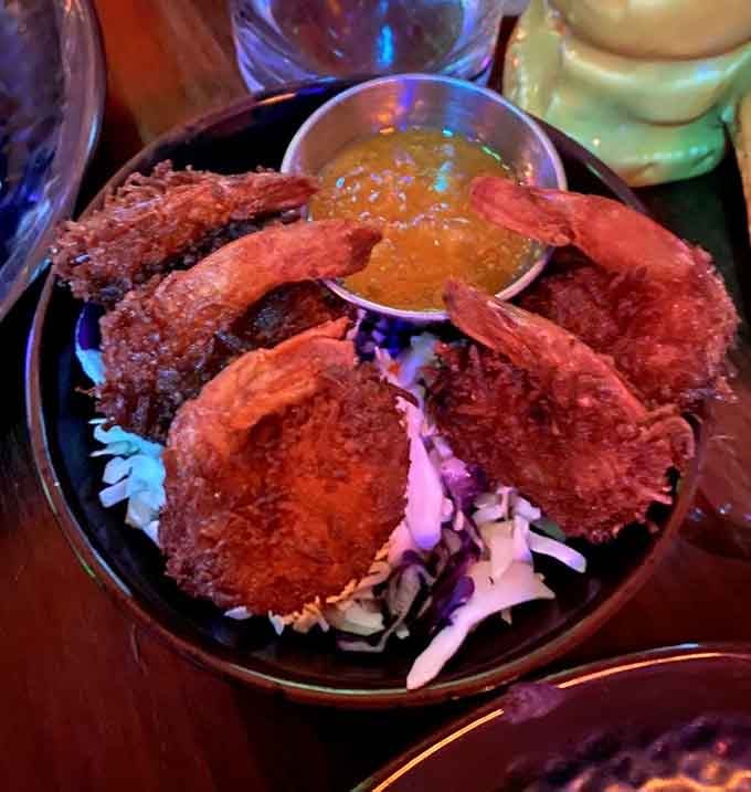 Golden coconut shrimp that crunch with every bite, served with a sauce that demands your attention immediately.