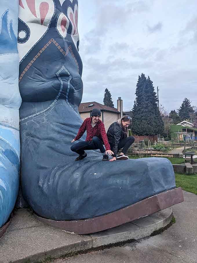 Visitors discover that climbing on giant boots is surprisingly acceptable behavior for adults at this park.