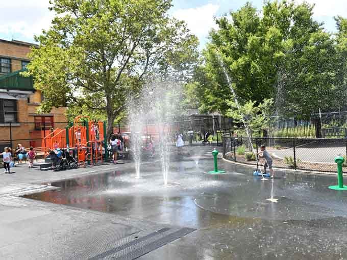 Nothing says summer quite like kids running through spray fountains, creating memories and requiring multiple towels afterward.