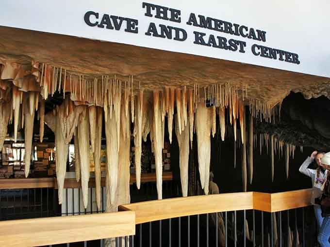 The American Cave and Karst Center welcomes visitors with impressive stalactite displays that set the stage for underground exploration ahead.