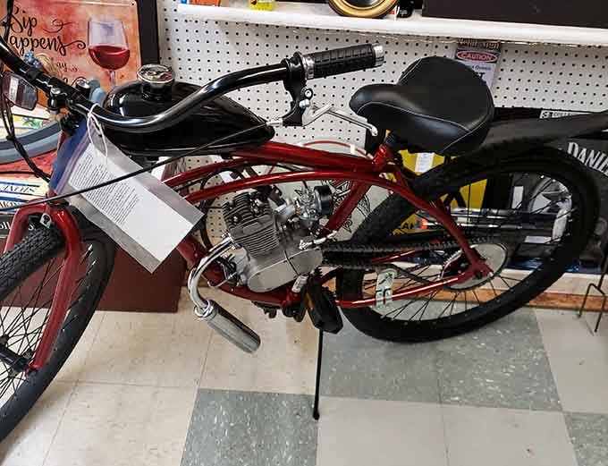 A motorized bicycle that screams freedom and midlife crisis in equal measure, parked perfectly between nostalgia and questionable life decisions.