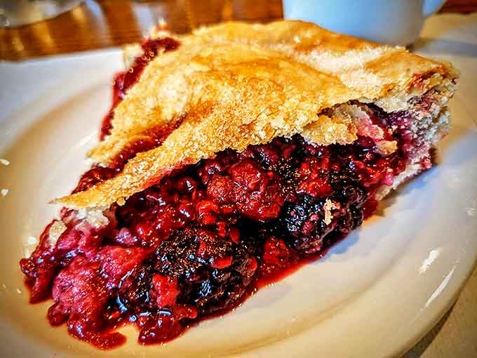 Berry pie that makes you understand why people used to cool these on windowsills. The perfect balance of sweet, tart, and "I need another slice."