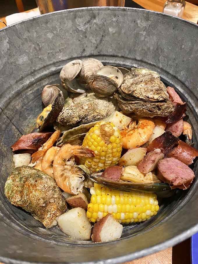 When your dinner arrives in a bucket and requires both hands, you know you're about to have a seriously good time.