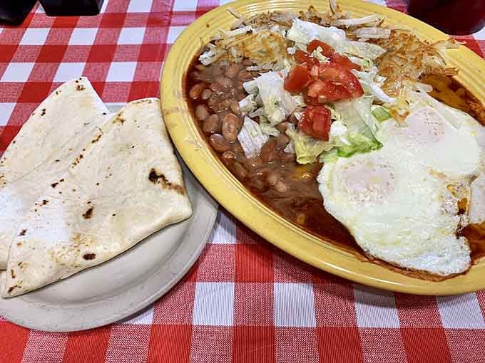 Huevos with beans, hash browns, and tortillas&mdash;the breakfast that says, "Go ahead, skip lunch. I've got you covered until dinner."