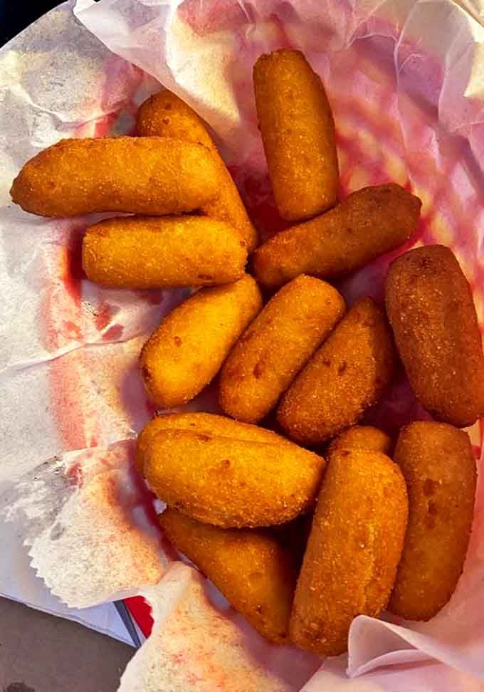 Hushpuppies done right&mdash;crispy exterior giving way to a soft, cornmeal interior. The perfect vehicle for sopping up seafood juices or popping between crab-picking sessions.