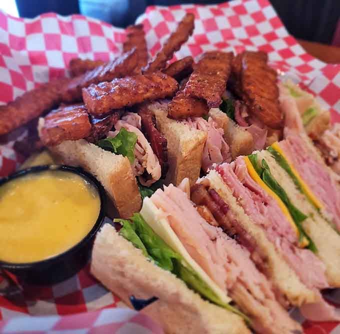 This towering club sandwich with perfectly seasoned potatoes is what happens when breakfast meets lunch and everyone wins.