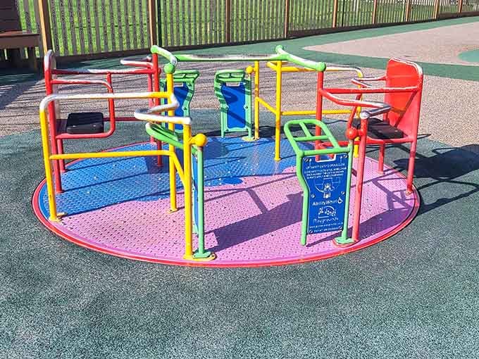 The colorful spinning platform brings kids together for shared dizzy laughter, regardless of their physical abilities or limitations.