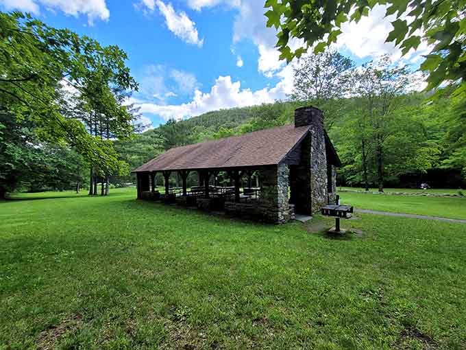 Stone pavilion surrounded by green space perfect for picnics that don't involve fighting ants.