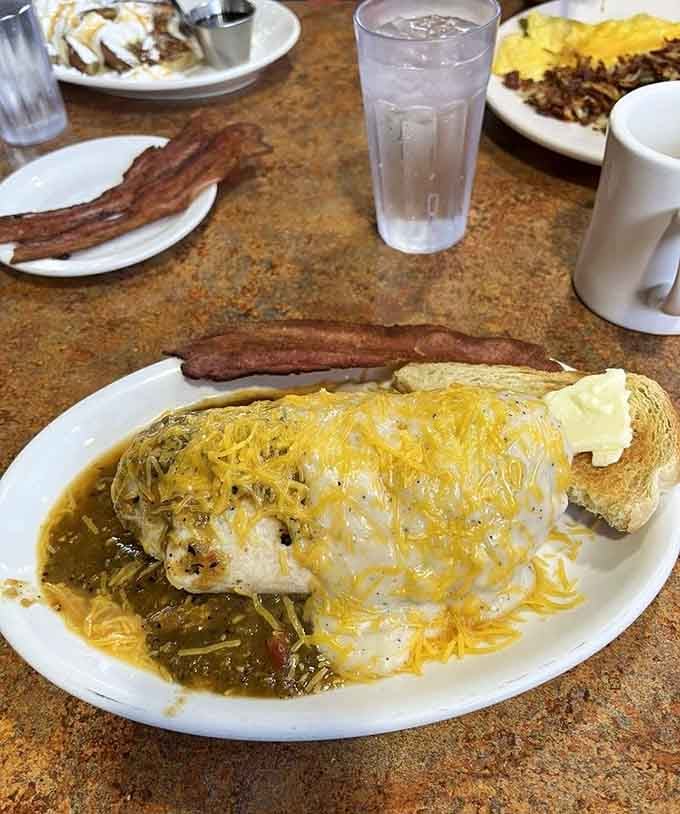 The breakfast burrito arrives with bacon reinforcements, because sometimes good things need to be even better.