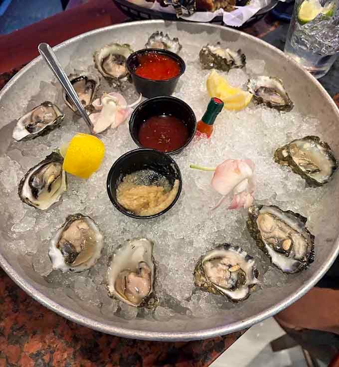 Fresh oysters on the half shell glistening on ice, bringing that briny ocean taste straight to your table.