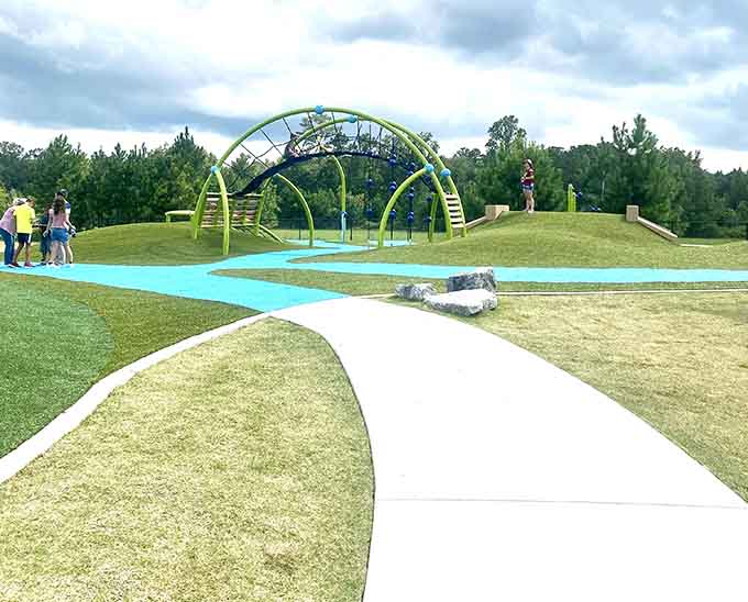 Smooth, accessible pathways wind through the playground, proving that thoughtful design makes all the difference for every family visiting.